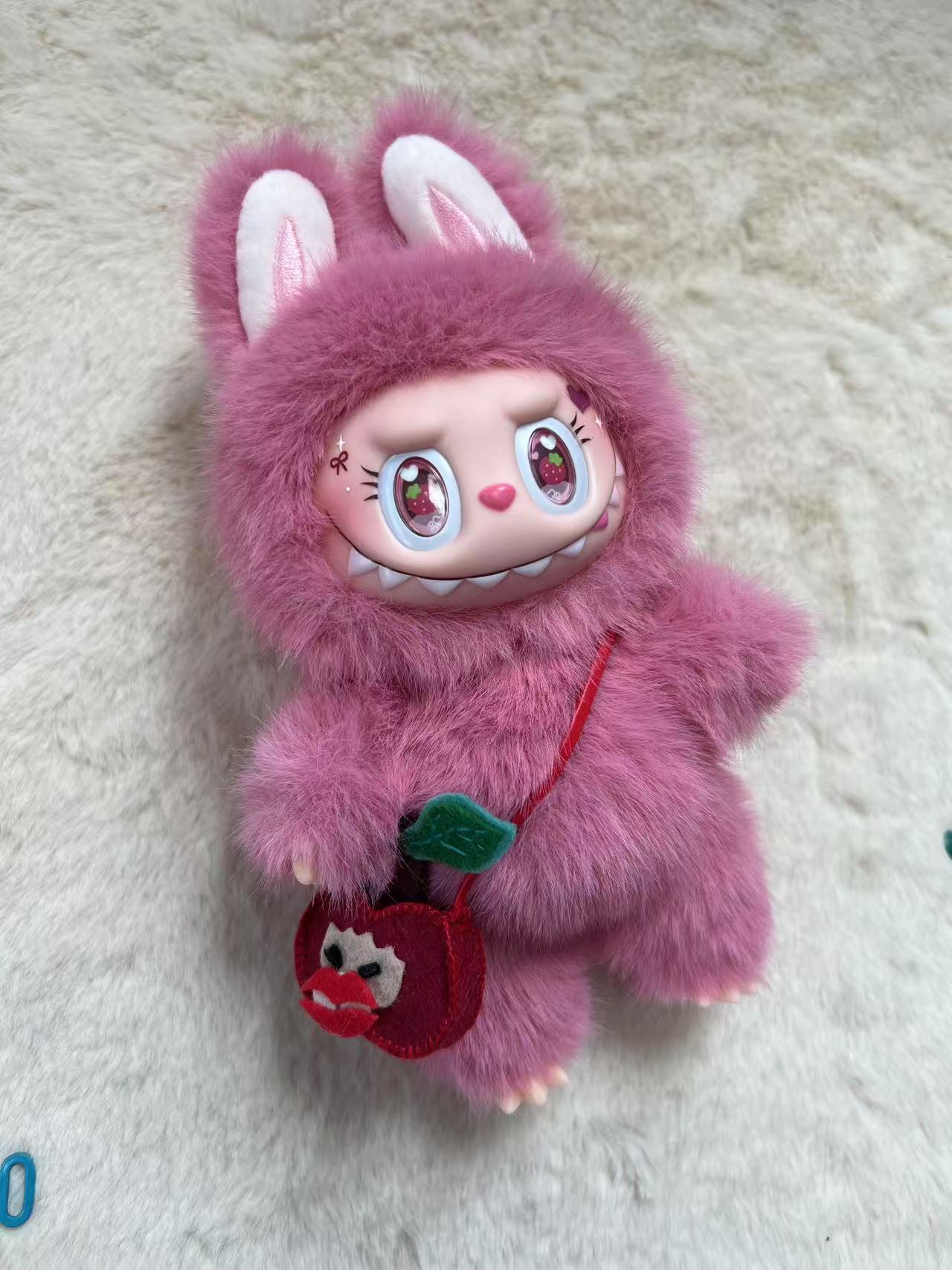 Strawberry labubu is handmade and each one is unique - labubufield